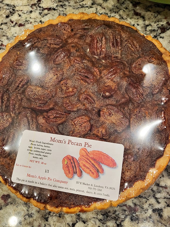 This pecan pie glistens with caramelized perfection, promising sticky-sweet bliss that'll make your dentist nervous but happy.