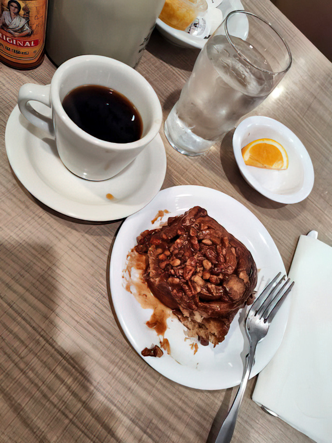 This isn't just coffee and a roll&mdash;it's morning salvation. The sticky pecan roll has that perfect balance of gooey center and caramelized edges.