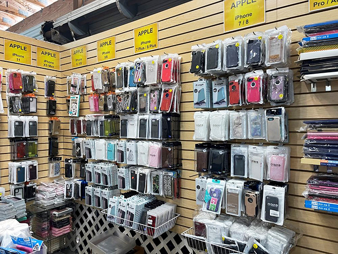 The wall of phone protection possibilities – because in Florida, your smartphone needs as much coverage as you do at the beach.