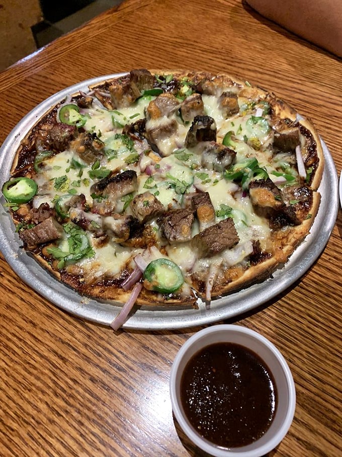 St. Louis meets Phoenix on a pizza that defies geography &ndash; brisket chunks and jalape&ntilde;os creating a cross-country flavor expedition worth every mile.