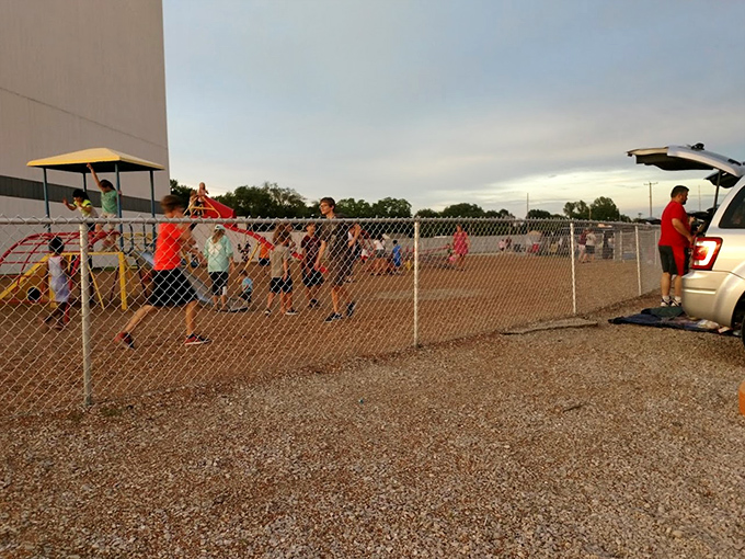 Pre-movie energy release zone where kids burn off excitement before settling in for the feature presentation.