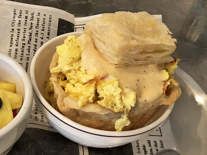 This isn't just a pot pie; it's a comfort food hug in a bowl, complete with a biscuit hat that deserves its own fashion magazine.