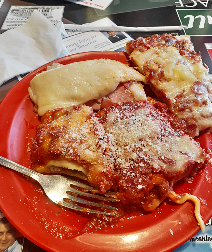 Behold the star of the show: pillowy ravioli swimming in marinara sauce that tastes like pure happiness.