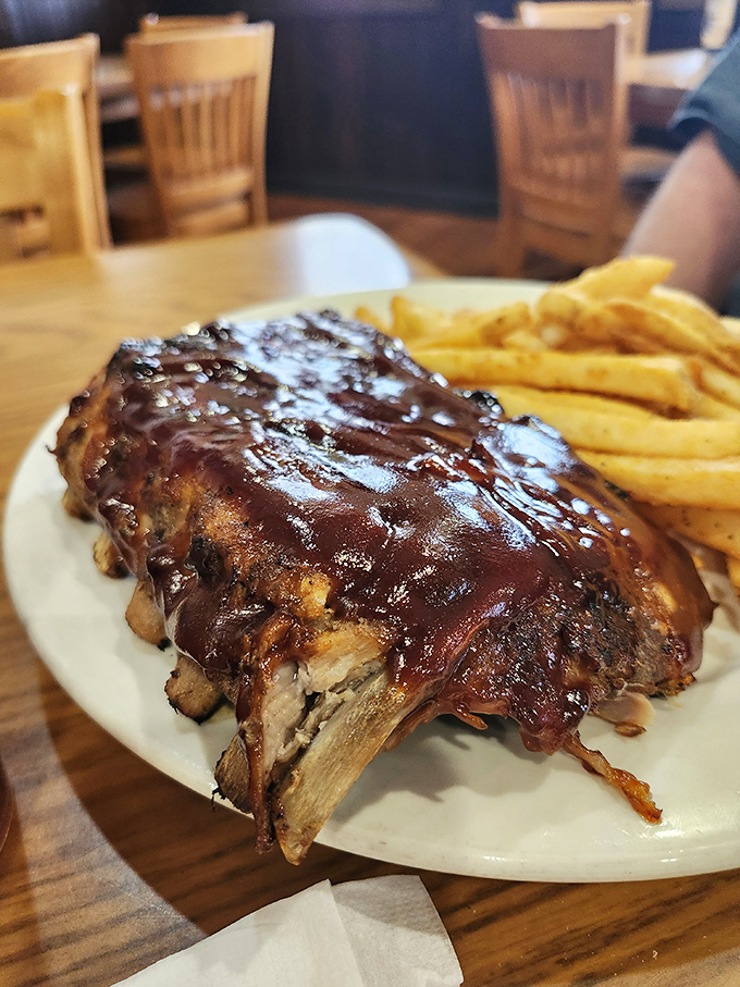 Fall-off-the-bone ribs glistening with sauce that would make even the most dedicated shirt-protector throw caution to the wind.