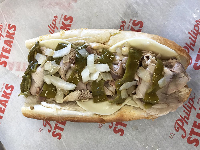 The roast pork sandwich with its cherry pepper sidekick. A dynamic duo that makes Batman and Robin look like amateurs.