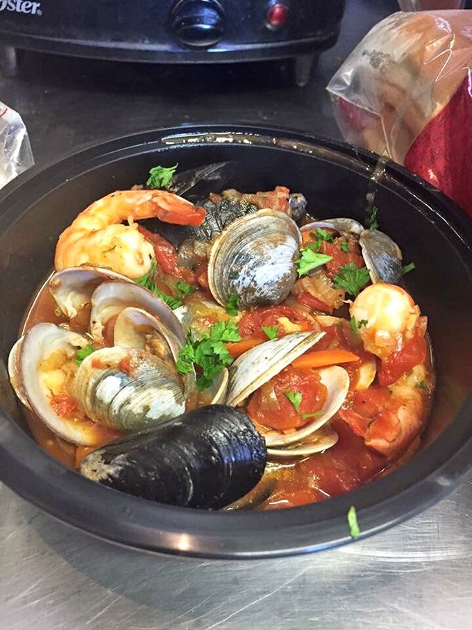 This seafood stew isn't just dinner, it's a Mediterranean vacation in a bowl. Clams, mussels, and shrimp having the kind of party your taste buds want an invitation to.