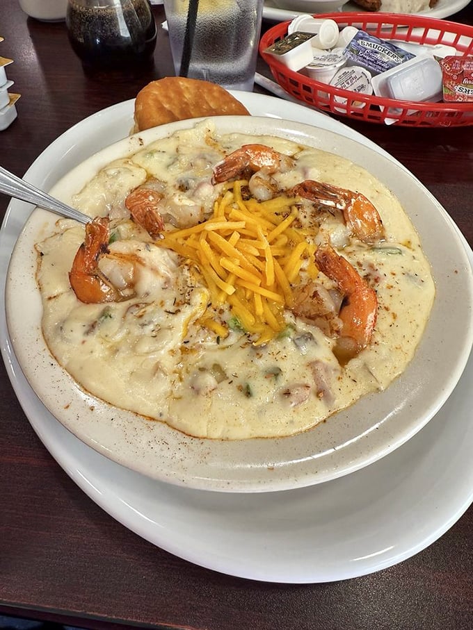 Shrimp and grits: where coastal Carolina meets comfort food heaven in a bowl that deserves its own ZIP code.