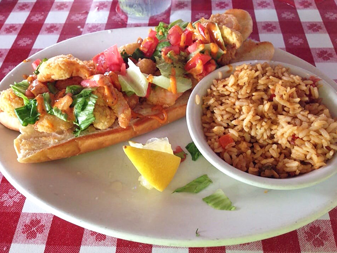The shrimp po' boy comes dressed to impress, while that Bahamian rice on the side has clearly been taking flavor very seriously.