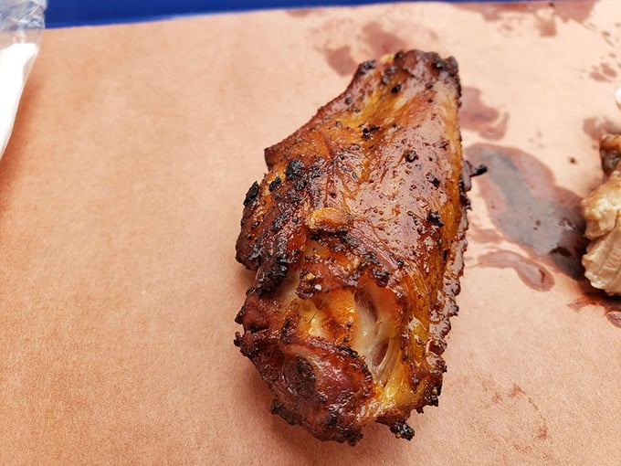 A perfectly charred chicken wing with skin so crisp and meat so tender, it makes you wonder why anyone would ever eat poultry any other way.