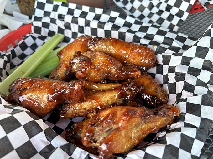 These wings didn't just fly&mdash;they soared through clouds of hickory smoke before landing gloriously on your table, glistening with sauce and possibility.