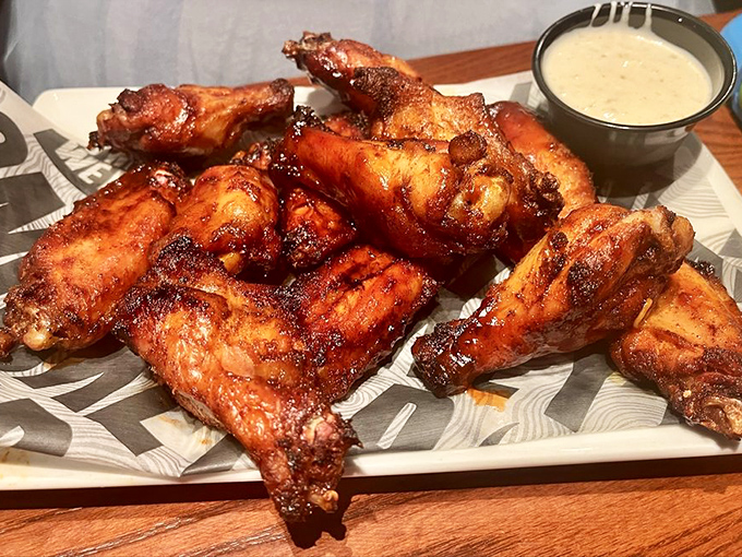 Smokey Bones' wings arrive looking like they've been dipped in a sunset&mdash;crispy, caramelized, and begging for their close-up.