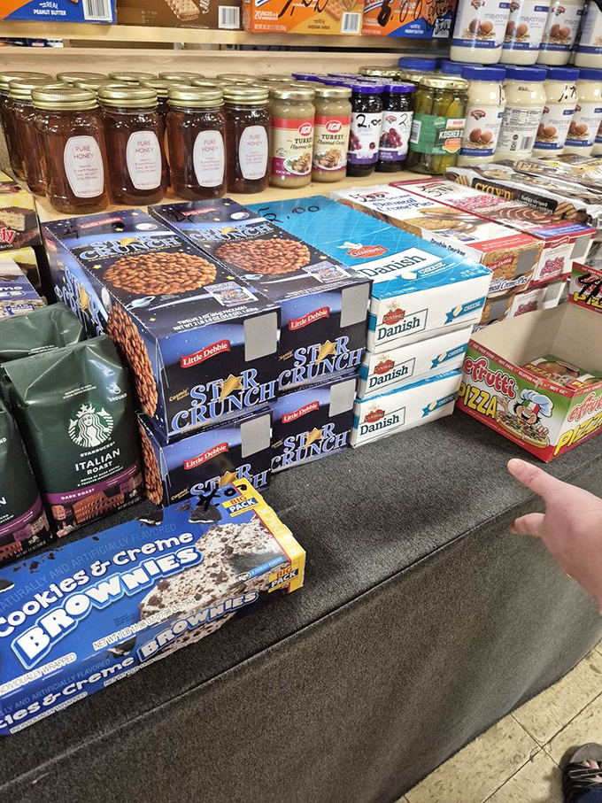 The snack aisle: where grocery store prices go to retire. Local honey jars stand proudly next to cereal boxes that whisper, "Yes, I'm still perfectly good!"