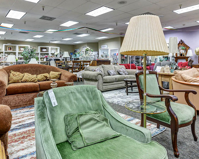 A living room tableau that whispers, "Yes, you can afford that mint green statement piece you've been eyeing in design magazines."