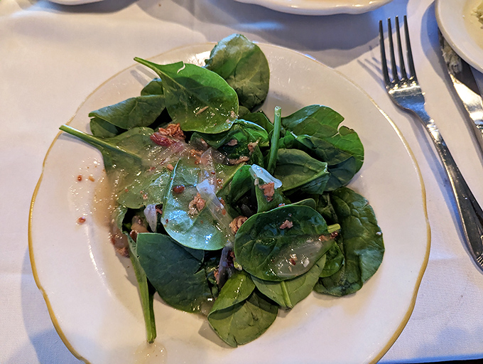Even the spinach salad gets the royal treatment. Fresh greens that actually make you forget you're eating something healthy.