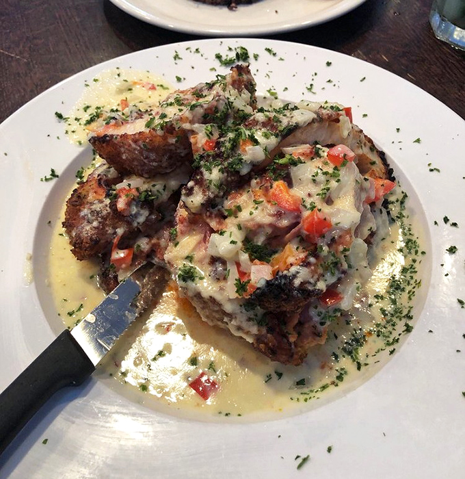 This isn't just chicken&mdash;it's chicken that went to finishing school. Smothered in cheese and sauce, it's dressed to impress your taste buds.