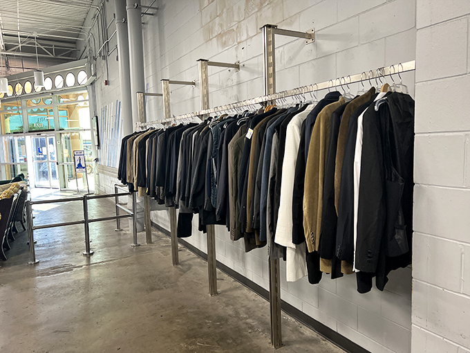 The suit section: where job interviews are won, wedding guests are dressed, and vintage fashion enthusiasts quietly hyperventilate with excitement.