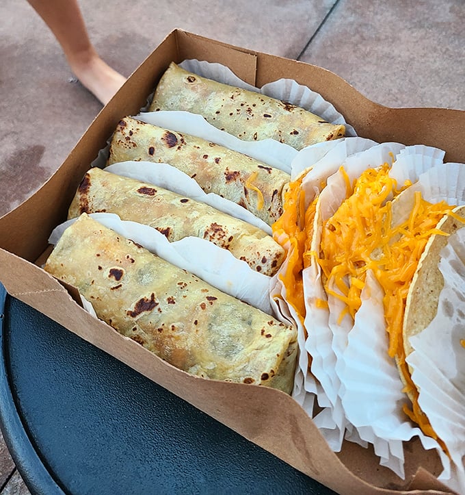 The box of happiness. These burritos aren't Instagram-bait; they're reliable comfort wrapped in flour tortillas with that signature orange cheese.