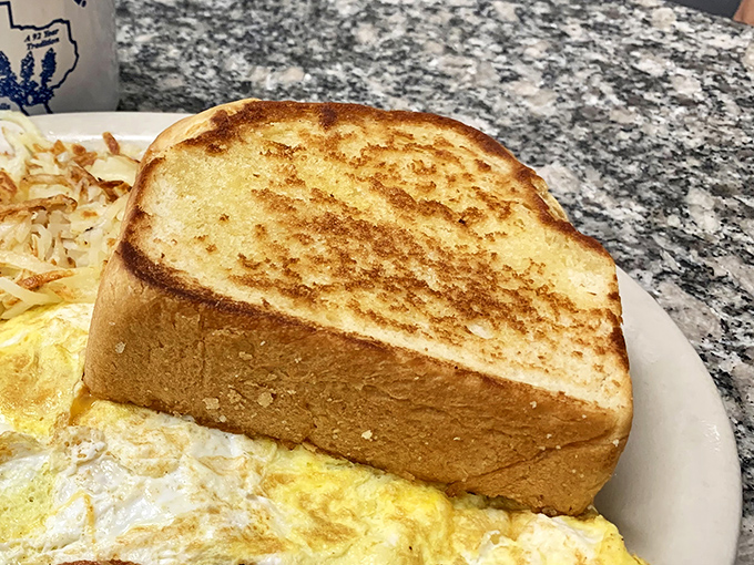 Texas toast so perfectly golden it deserves its own Instagram account. This isn't just bread&mdash;it's a buttery canvas of breakfast possibilities.