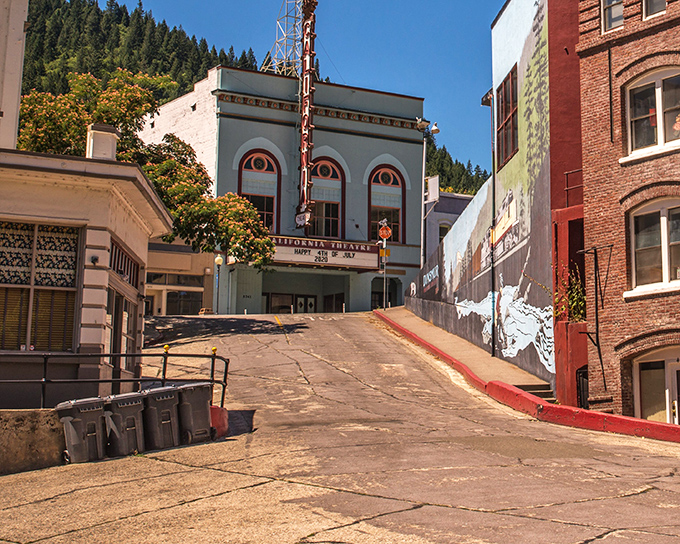 A different angle reveals how the California Theatre and Cornerstone Bakery nestle into Dunsmuir's downtown, with forested mountains creating a perfect backdrop.