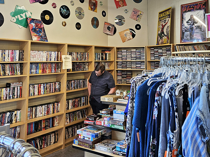 The media section offers a nostalgic trip through entertainment history. DVDs, CDs, and books create a time capsule of pop culture waiting to be rediscovered.