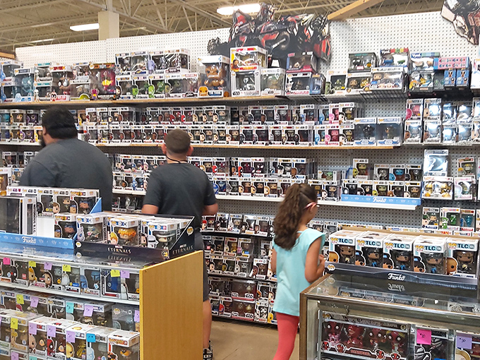 Modern treasure hunters scanning rows of Funko Pop figures, proving nostalgia now comes in collectible vinyl form.