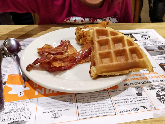 The breakfast power couple that never disappoints &ndash; a golden waffle with perfectly crisped bacon, proving that simplicity executed flawlessly beats complexity every time.