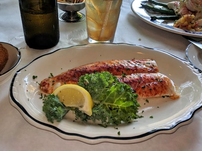 These walleye steaks arrive looking like golden treasures, perfectly seasoned and absolutely worth the drive to Mosinee.