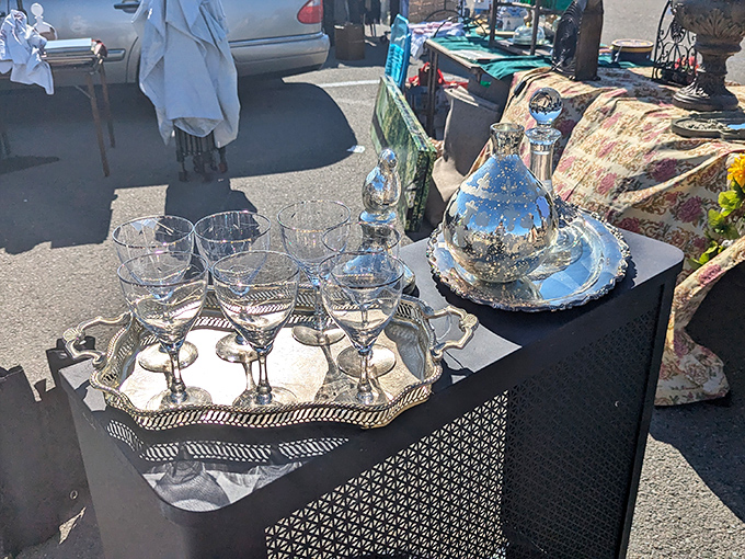 Liquid history in crystal form! This silver service and delicate glassware collection once toasted special occasions in homes long before Netflix existed.