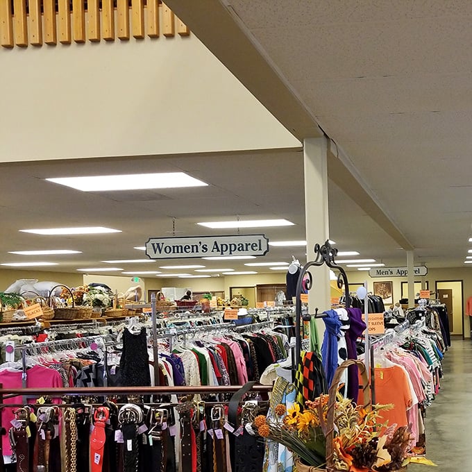 The women's section stretches endlessly, like a fashion runway where everything's already marked down.