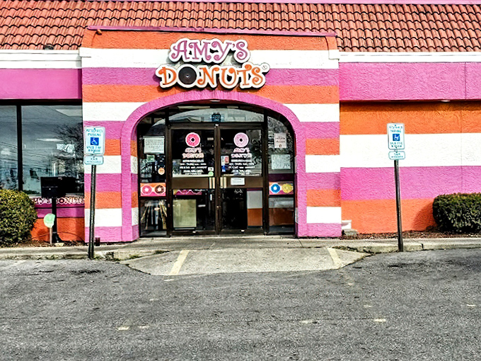 Amy's Donuts' candy-striped building is as bold and colorful as the treats they serve inside.