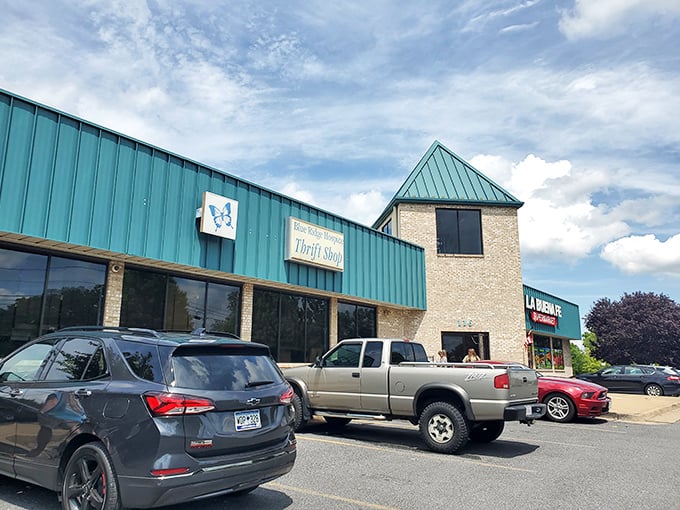 Blue Ridge Hospice Thrift's distinctive teal roof signals a shopping adventure with heart. Every purchase here does double duty!