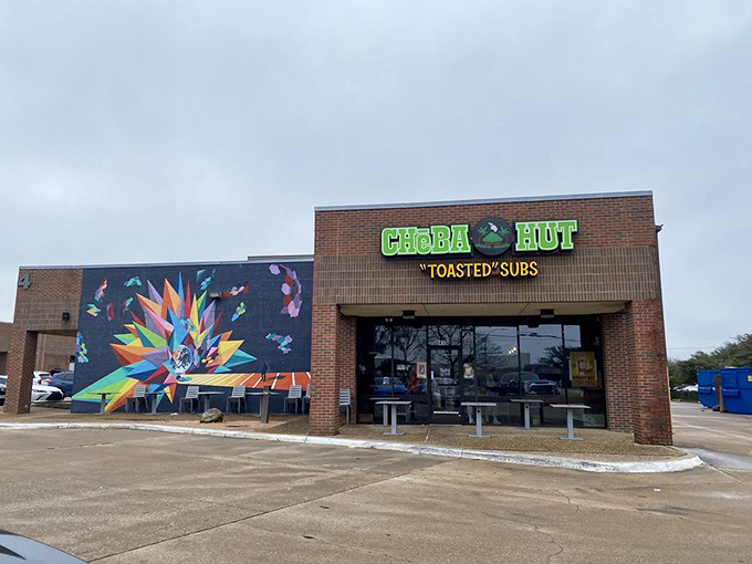 Cheba Hut's vibrant exterior mural adds a splash of artistic flair to your sandwich adventure. Creativity extends from walls to bread.