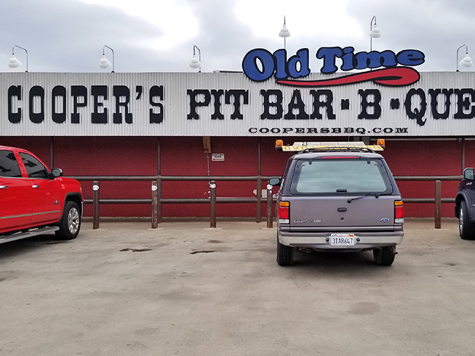 Cooper's Old Time Pit Bar-B-Que announces itself with vintage confidence. That sign has witnessed countless barbecue dreams come true.