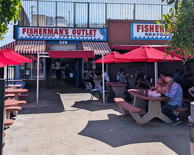 Red umbrellas and picnic tables at Fisherman's Outlet create the perfect casual setting for seriously good seafood in downtown LA.