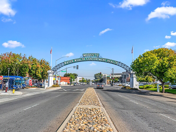 The famous "Water Wealth Contentment Health" arch welcomes you to Modesto, where your retirement dollars find contentment too.