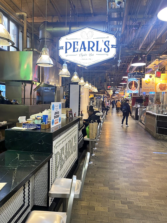 Pearl's Oyster Bar: where Reading Terminal Market's hustle meets the zen of perfect oyster shucking. A counter worth waiting for!