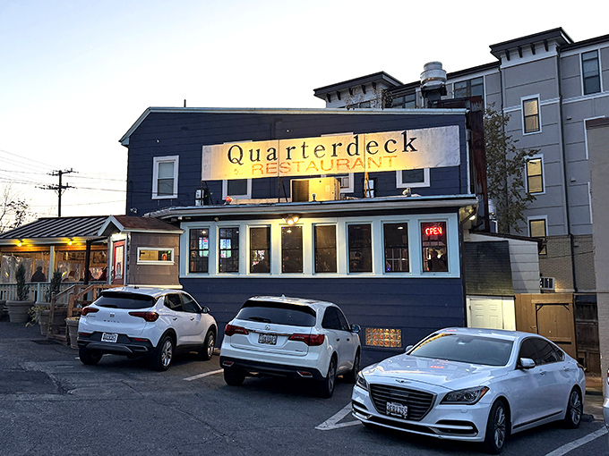 Navy blue building, seafood gold inside! Quarterdeck's simple exterior belies the crab-cracking festivities waiting within.