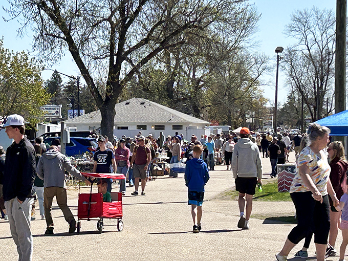 Spring crowds gather early, knowing the best vintage finds disappear faster than fresh donuts at dawn.