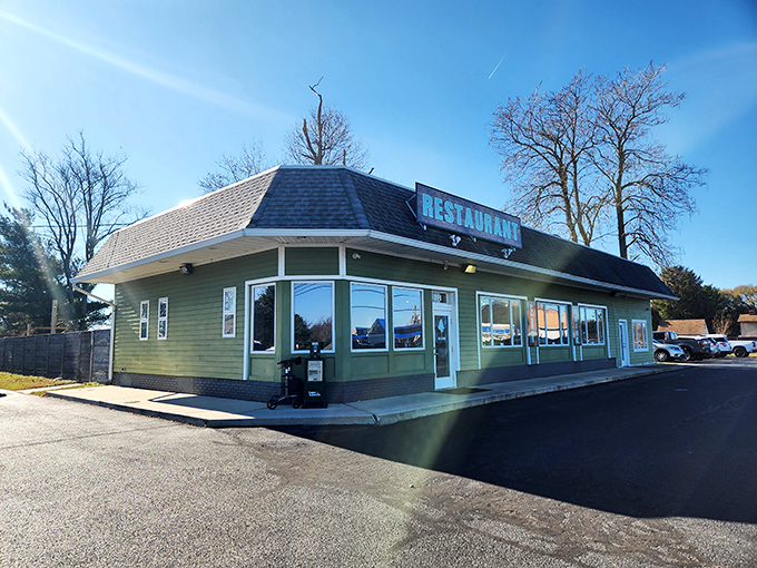 The Backyard's mint-green building stands ready to serve up cookout-style burgers without the hassle of grilling yourself.