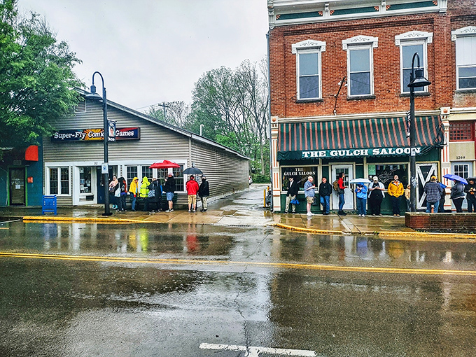 Even on drizzly days, this main street buzzes with the kind of energy that makes ordinary feel extraordinary.