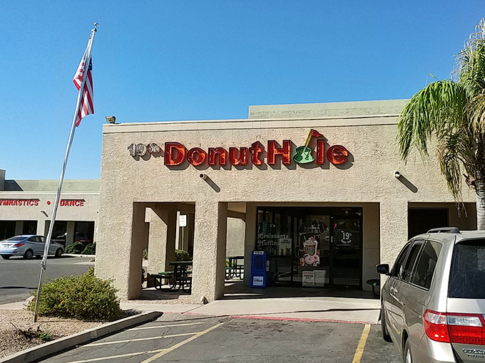 Simple storefront, American flag, and donuts that would make your grandpa say, "Now THAT'S a proper breakfast!"