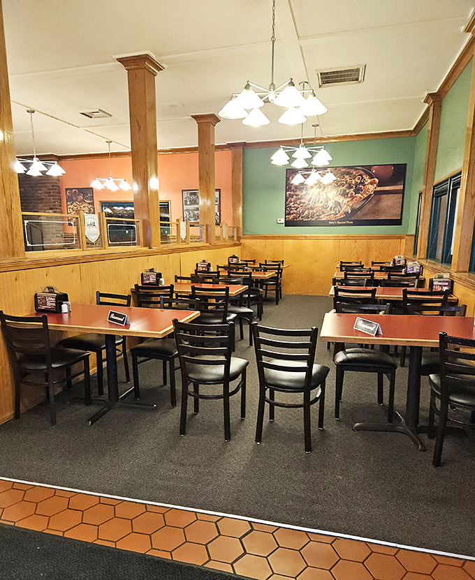 Inside Abby's, wood paneling and simple tables set the stage for what matters: pizza that lives up to that "Legendary" promise on the sign.