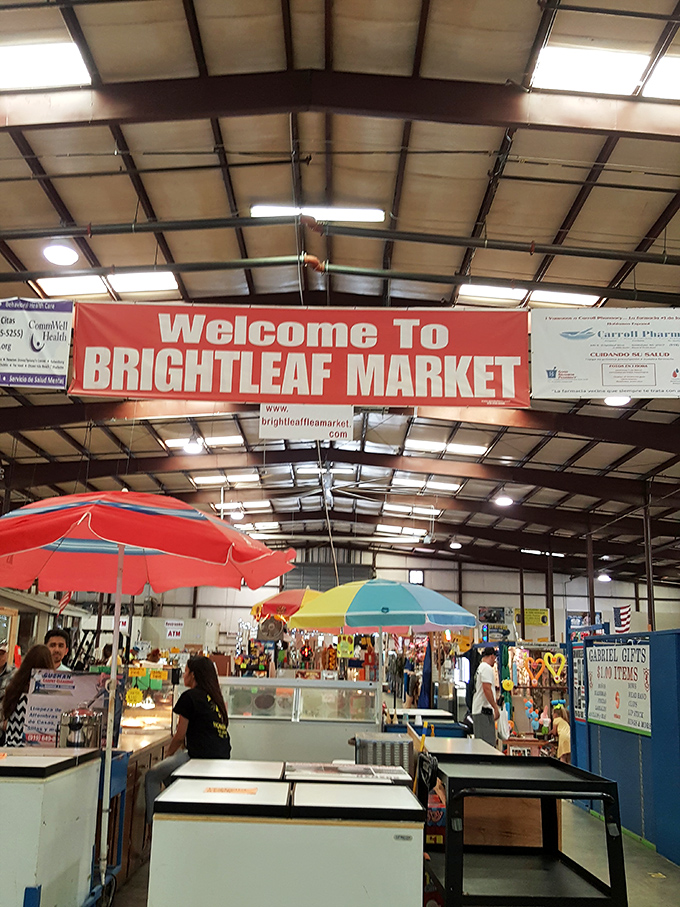 Those colorful umbrellas aren't just decoration - they're setting the stage for the carnival of treasures waiting below at Brightleaf.