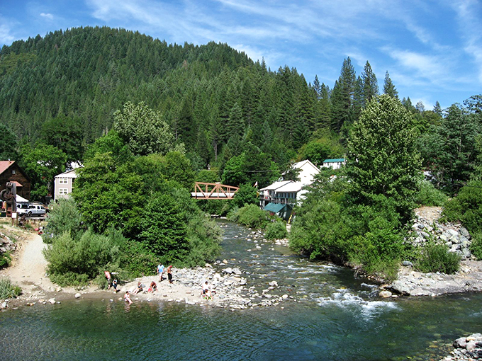 The crystal-clear river running through Downieville once yielded fortunes in gold, now offering peaceful respite for visitors to this mountain hamlet.