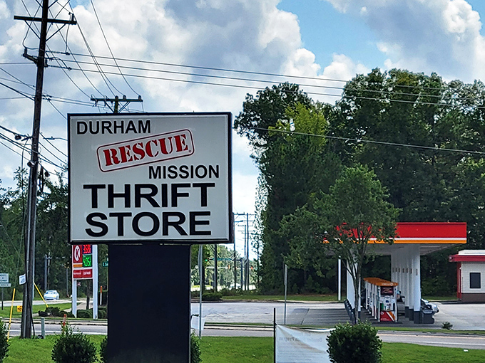 That bold roadside sign for Durham Rescue Mission Thrift Store cuts through the visual noise. A landmark for savvy shoppers with big hearts.