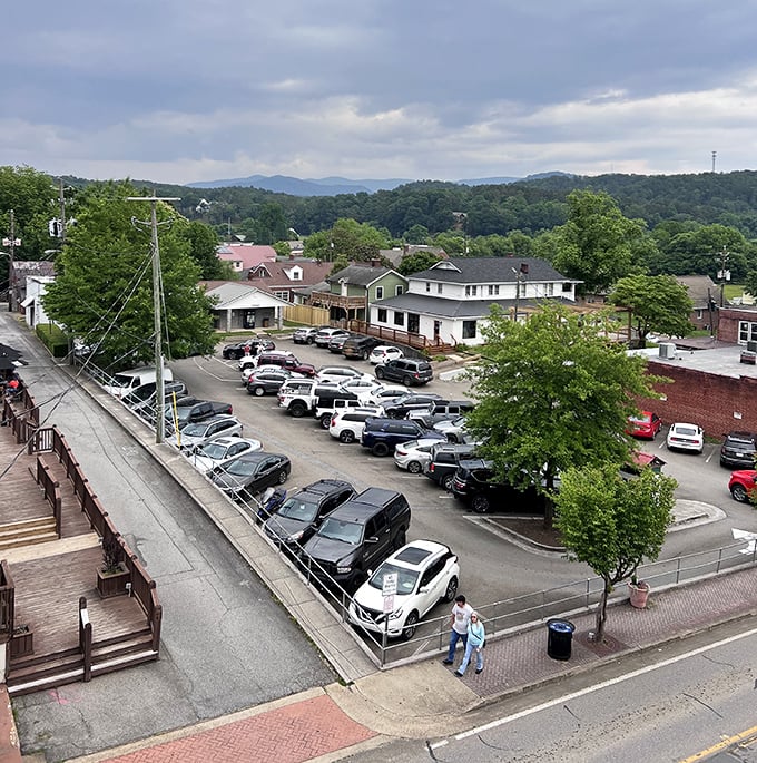 From this vantage point, Ellijay unfolds against mountain backdrops – where parking lots meet paradise in small-town Georgia.