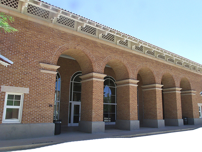 This stately brick building in Florence stands with the quiet dignity of someone who's seen it all but keeps the juiciest stories to themselves.