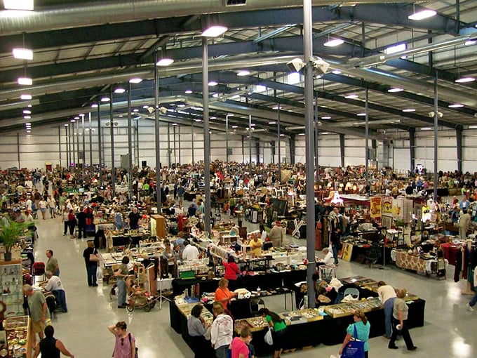 From above, the battlefield of bargains stretches as far as the eye can see—a sea of tables where victory means finding that perfect something.