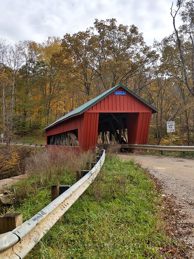 Autumn's golden frame makes this crimson crossing ready for its magazine cover moment. Postcard-perfect in every way!