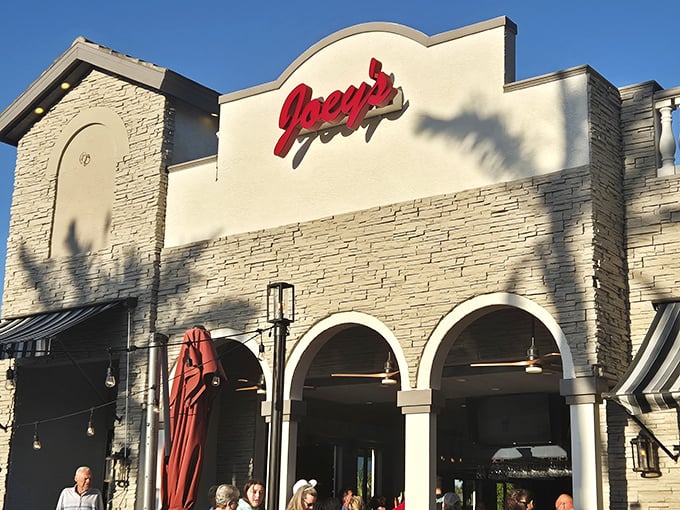 Those red umbrellas at Joey's beckon you to enjoy island breezes with your slice. Pizza paradise found.